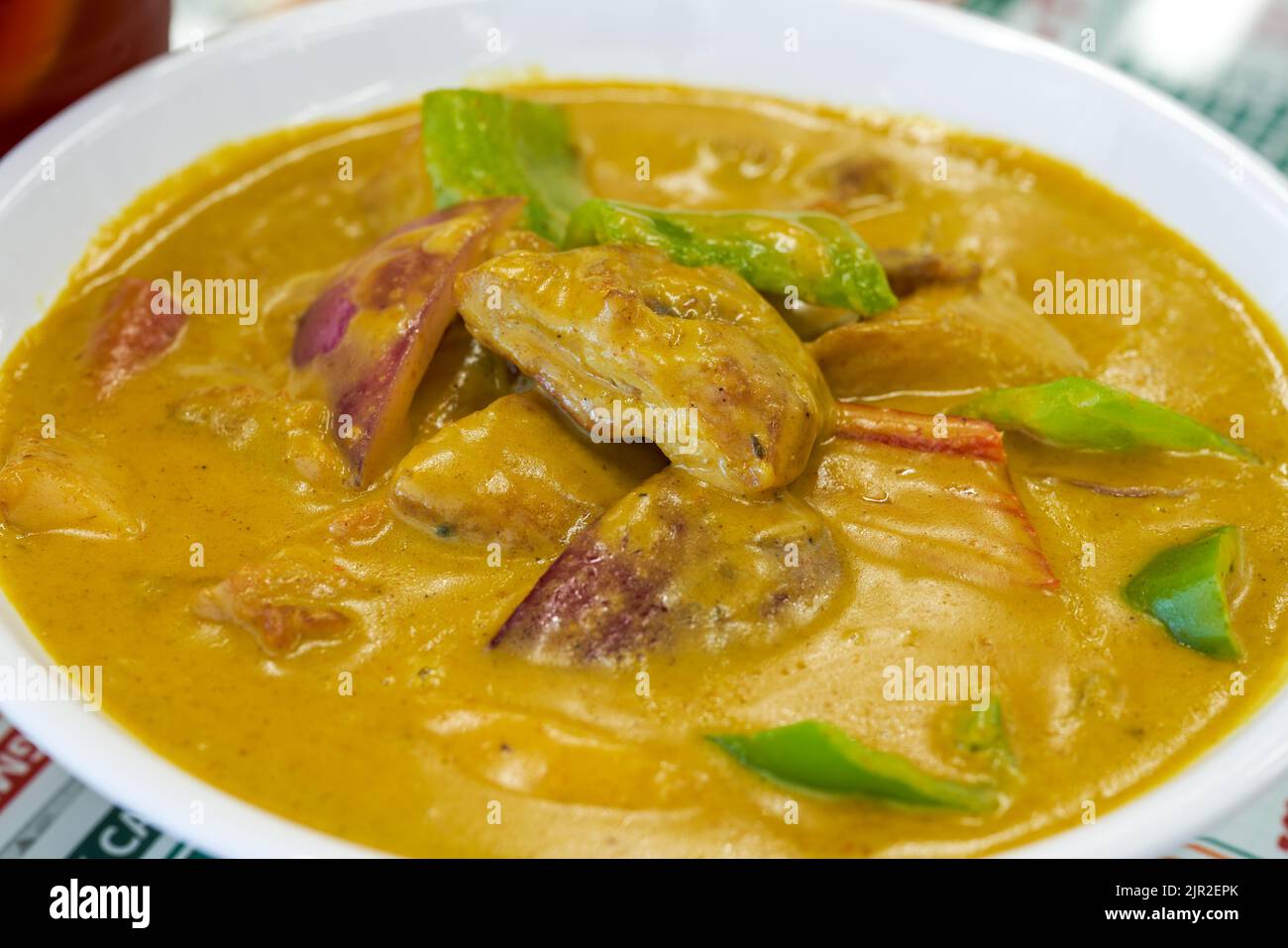 A delicious and tempting curry chicken chop Stock Photo - Alamy