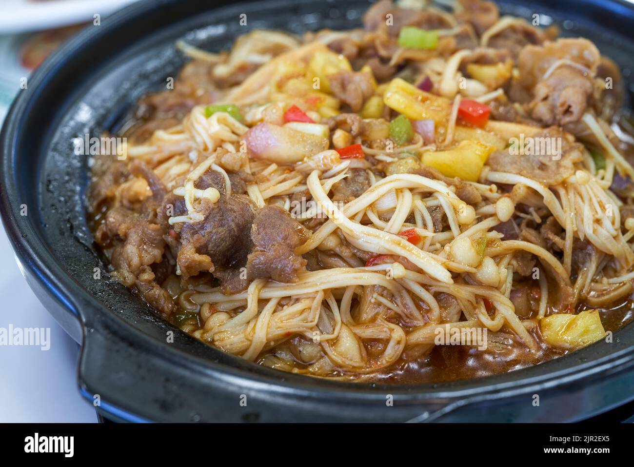 A Delicious Chinese Dishes, Flammulina Fatty Beef Stock Photo - Alamy