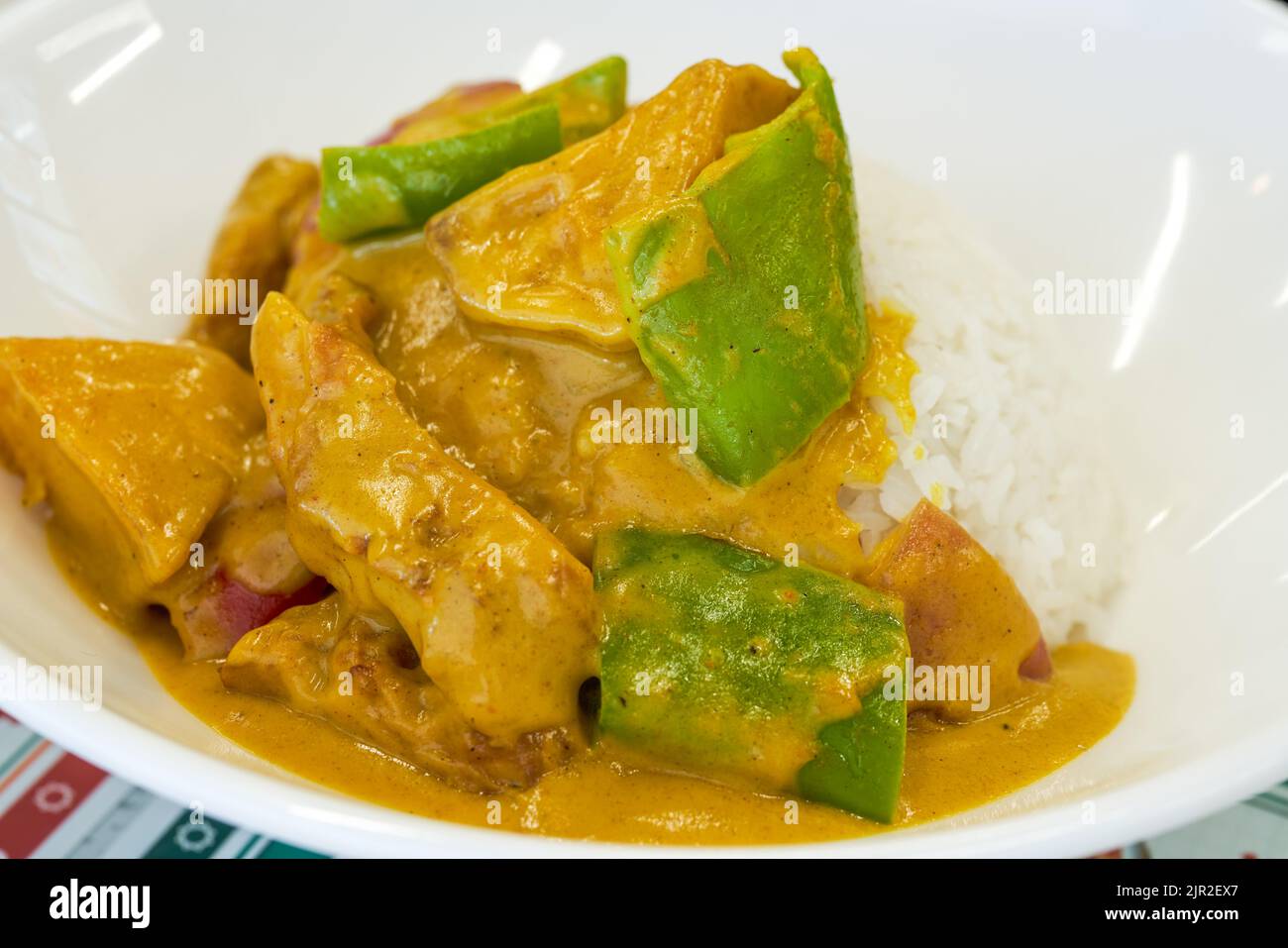 A delicious and tempting curry chicken chop Stock Photo - Alamy