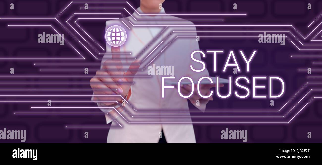 Hand writing sign Stay Focused. Word Written on Be attentive Concentrate Prioritize the task ...