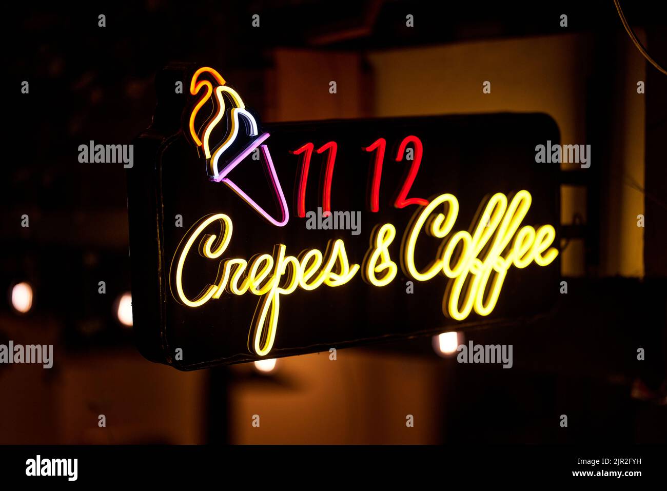 A closeup of Crepes & Coffee neon led light sign Stock Photo - Alamy