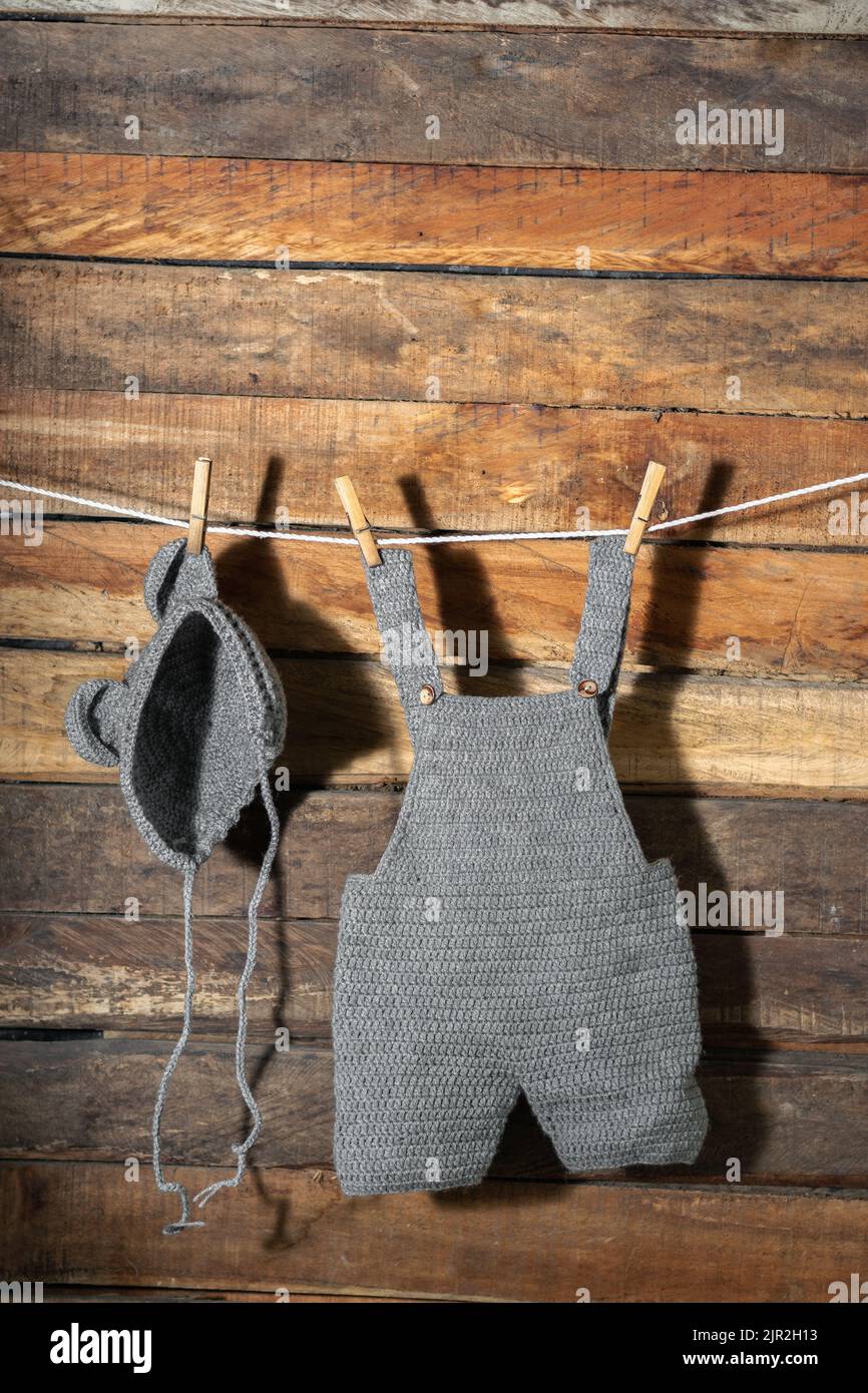Baby clothes hanging drying in hi-res stock photography and images - Alamy