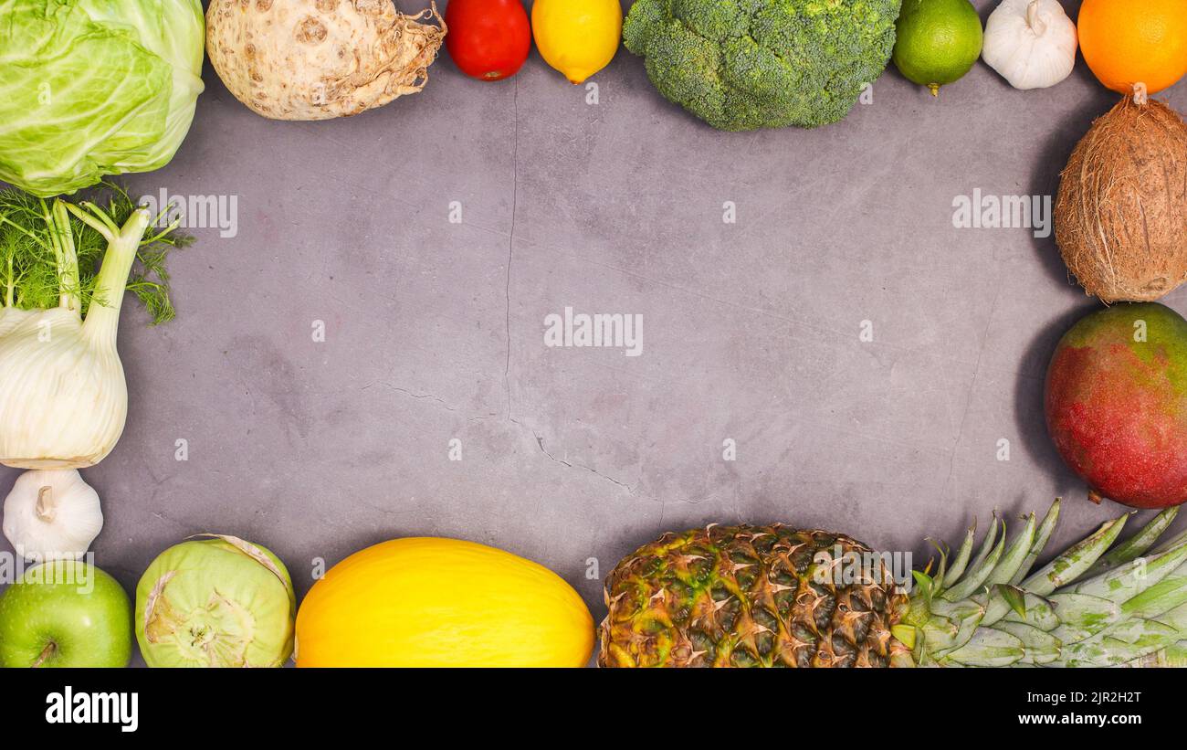 HEalthy life frame with fresh organic fruits and vegetables on dark ...