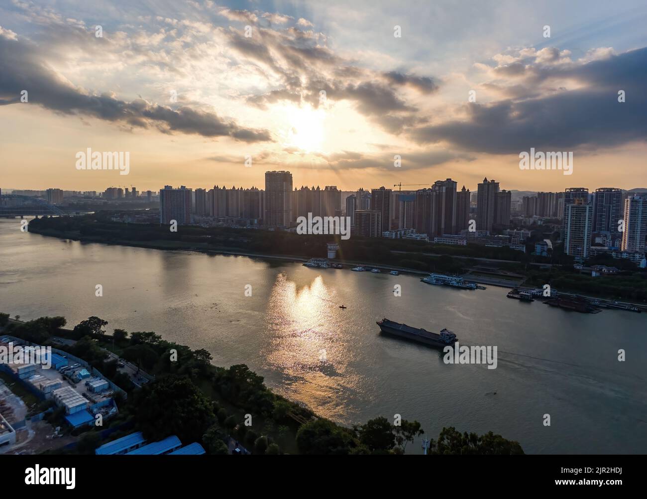 The city riverside architectural landscape and the sand ship passing by ...