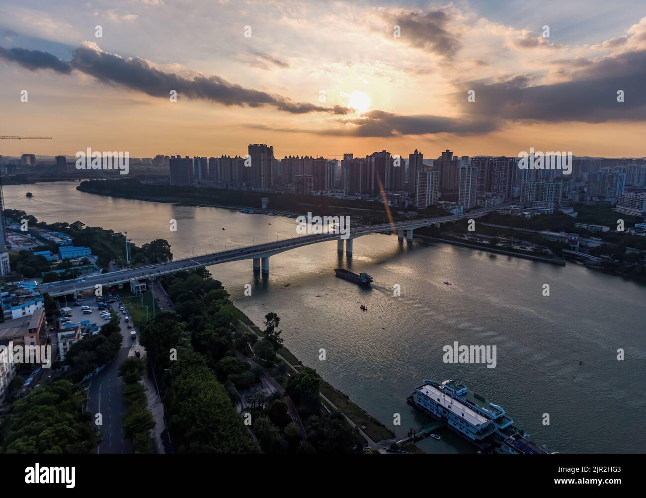 The city riverside architectural landscape and the sand ship passing by ...