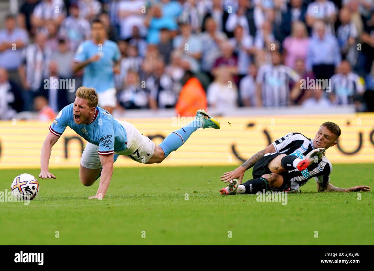 Newcastle United's Kieran Trippier (right) fouls Manchester City's Kevin De Bruyne resulting in ...