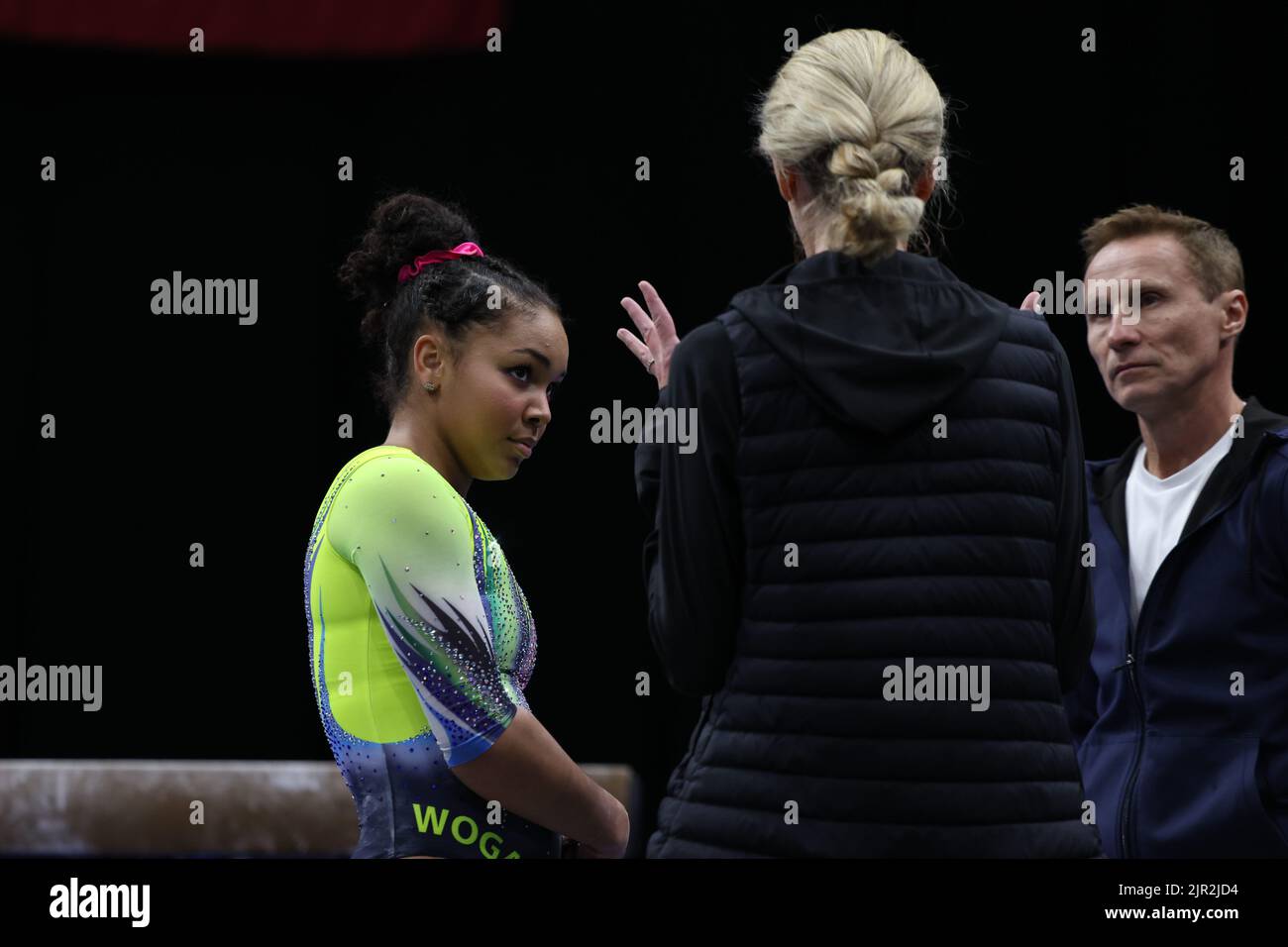 August 19, 2022: Konnor McClain (WOGA) with coaches Anna Liukin (back ...