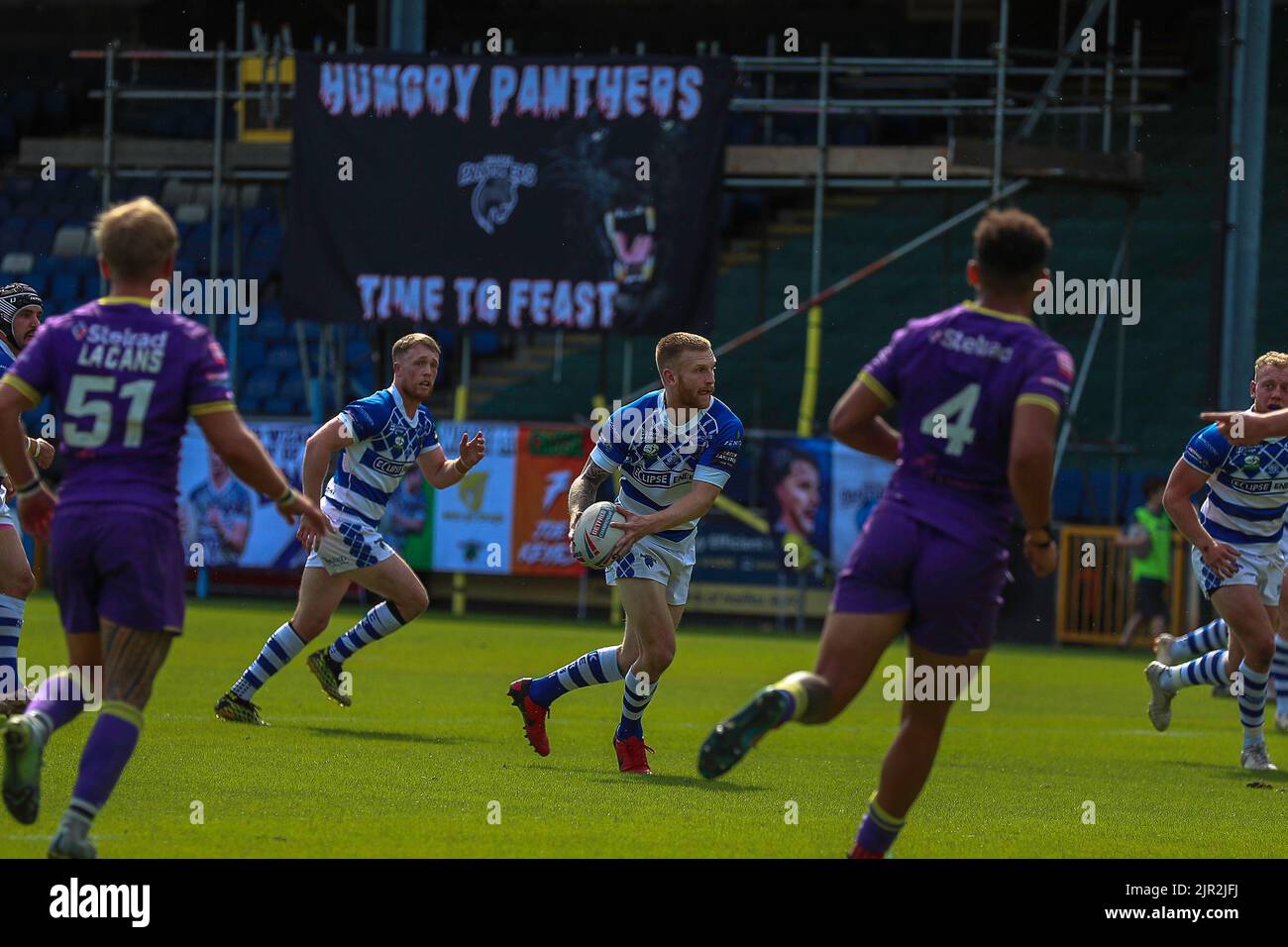 Halifax, UK. 21st Aug, 2022. *** Joe Keyes on the charge for Halifax ...