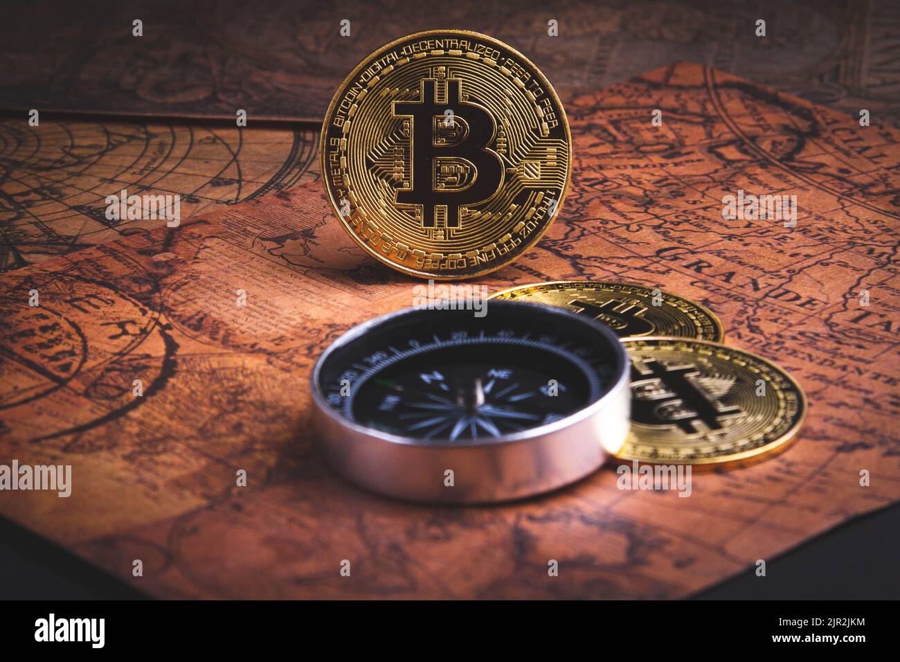 Compass and bitcoin. Travel and cryptocurrencies. Buying tickets with ...