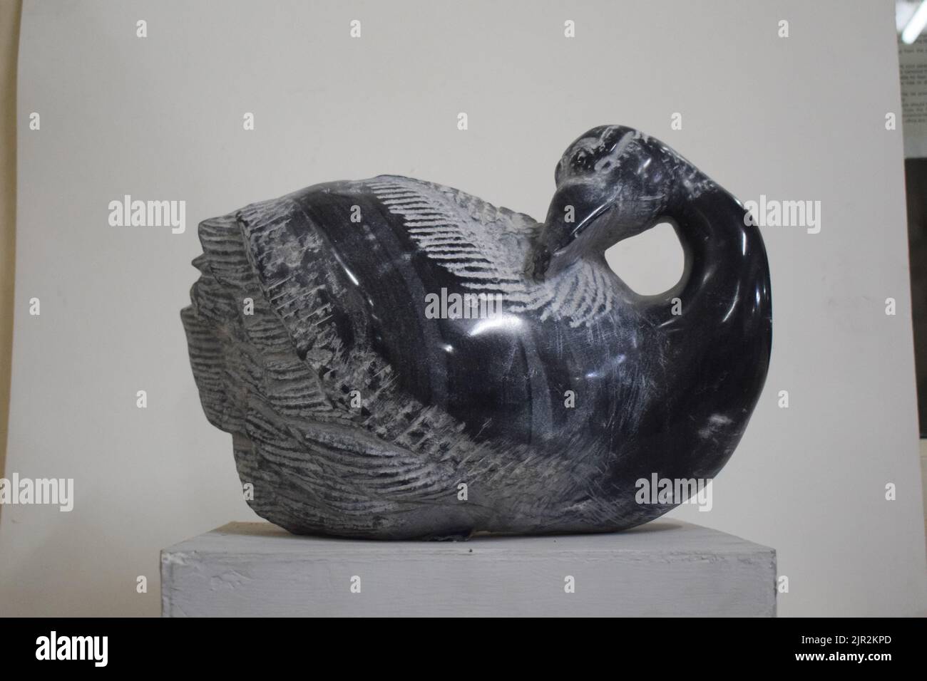 Sculpture of swan which is made from black stone Stock Photo - Alamy