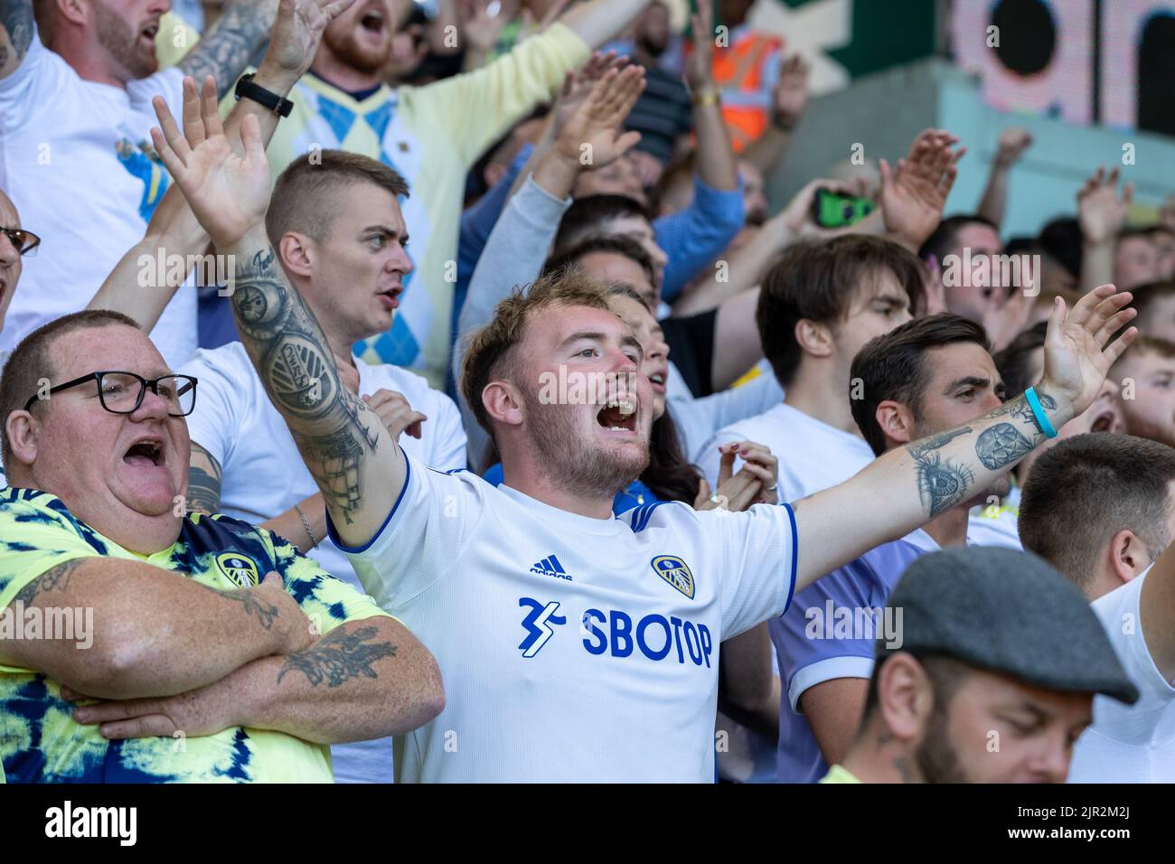 The Leeds United supporters cheer on their team during the game Stock ...