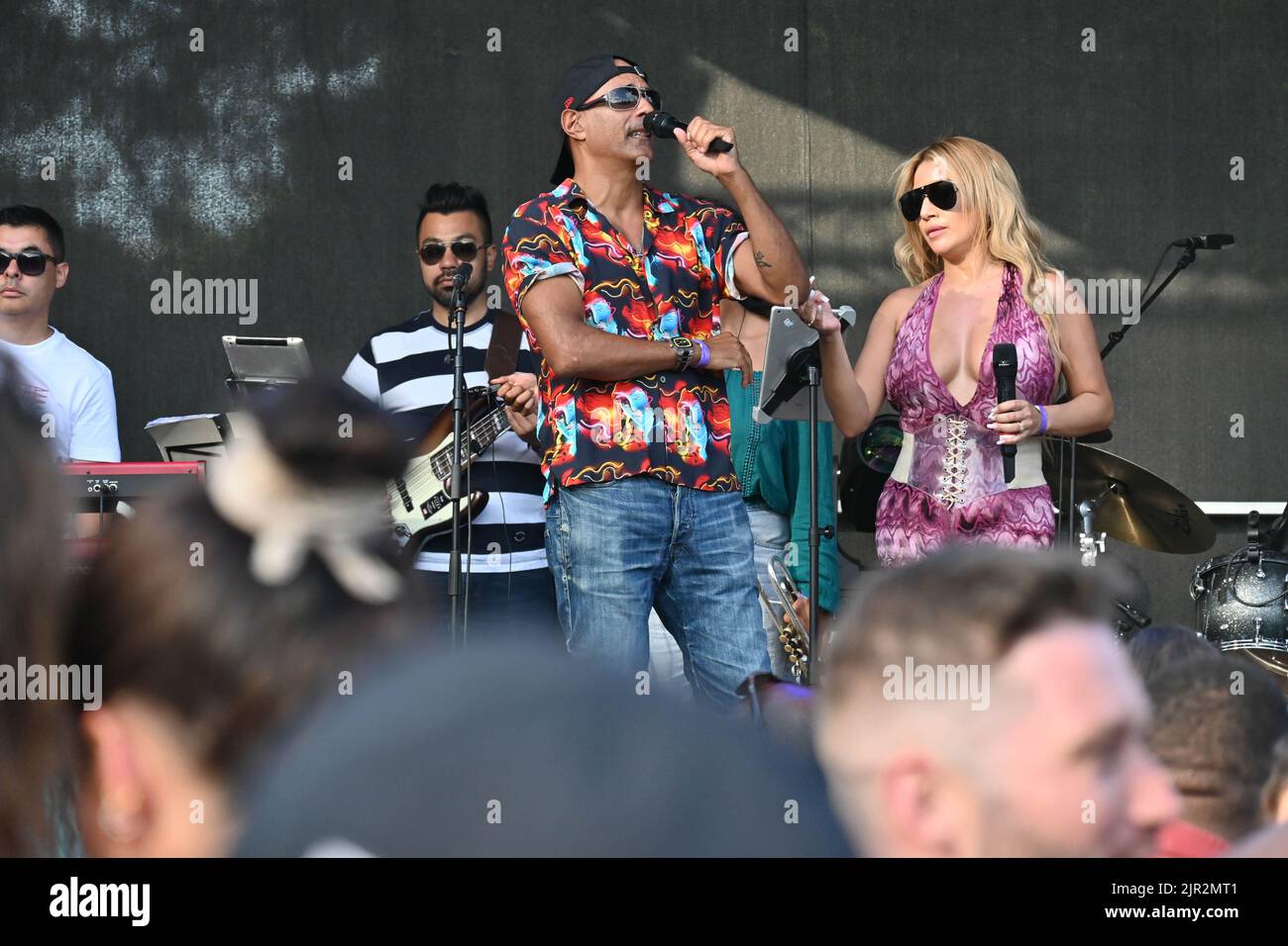 London, UK. 21 August 2022. Presenter, Jemelin Artigas and Richard ...