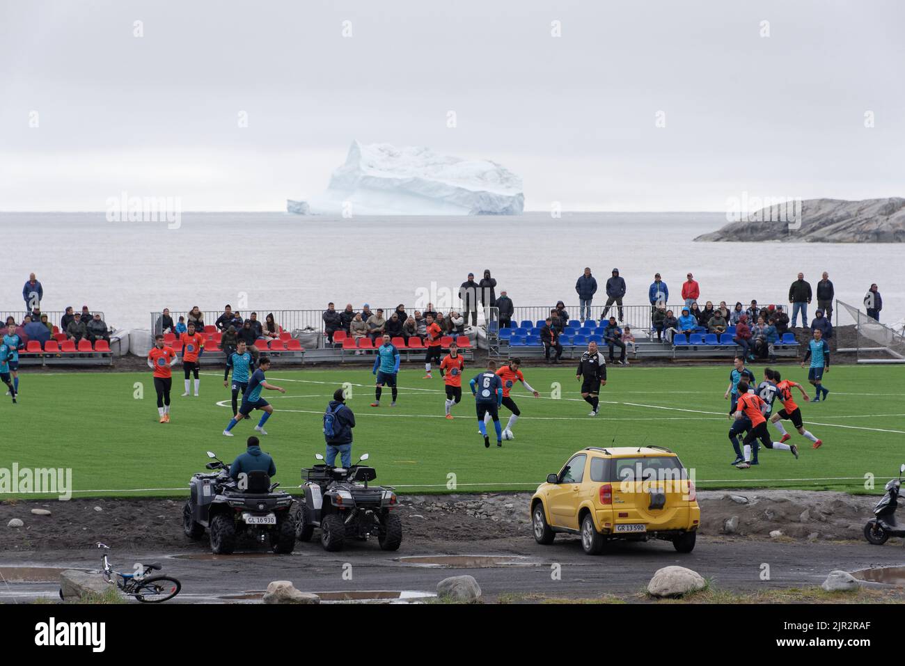 Small local football team playing among icebergs hi-res stock ...
