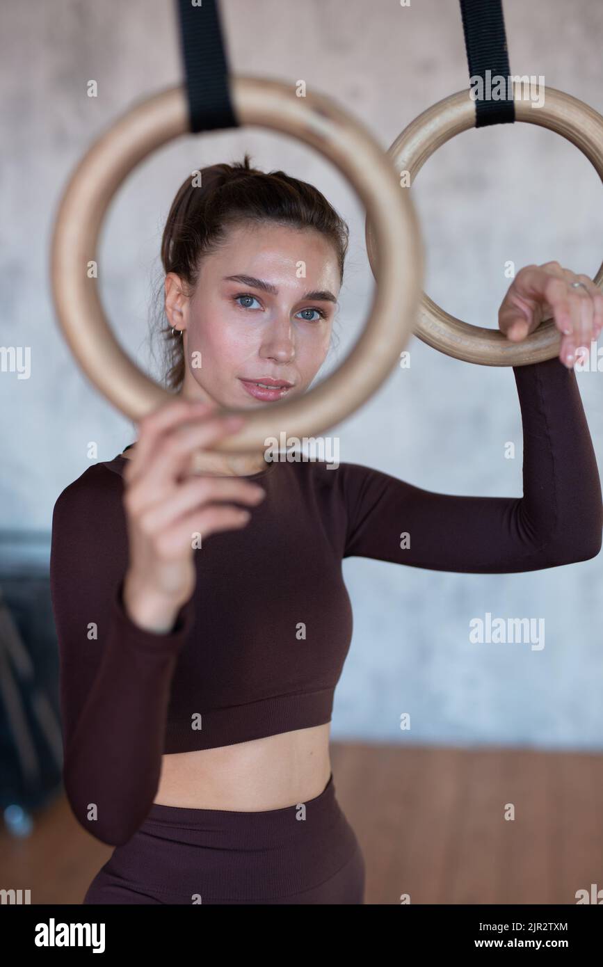 Women workout gymnastic rings hi-res stock photography and images - Alamy