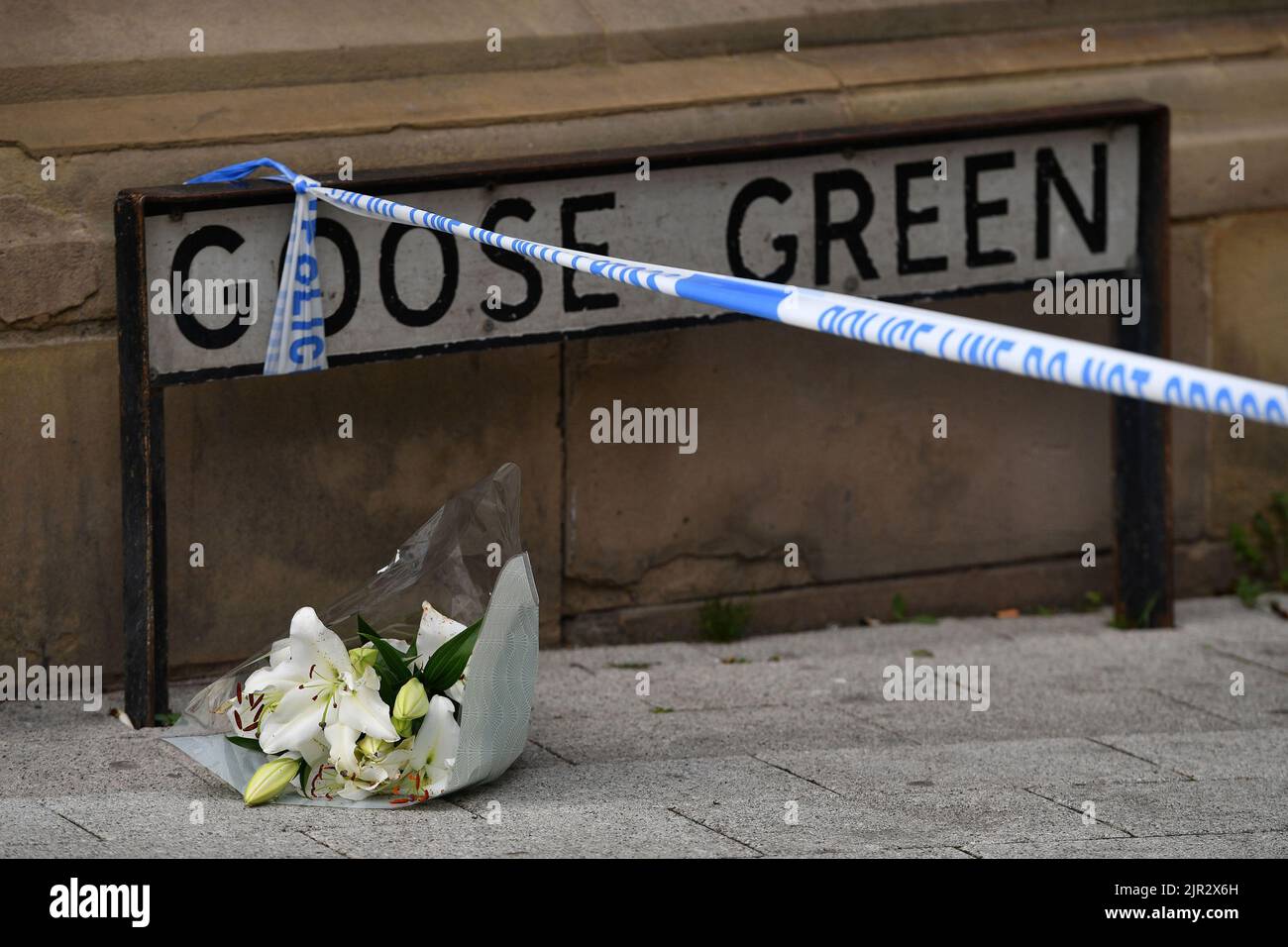 A lone floral tribute at the scene in Railway Street in the Goose Green ...
