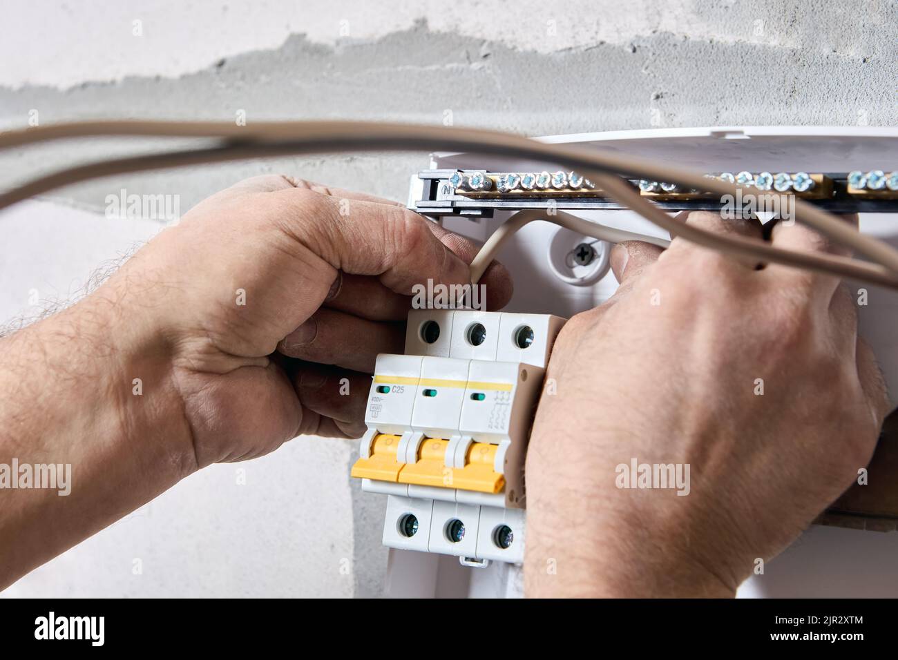 Electrical work to install new panel of electric distribution board ...