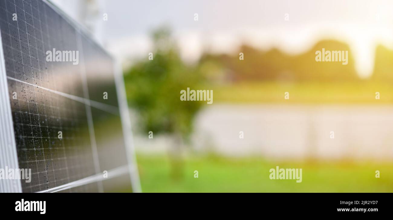 Set of black Solar Panels ready for installation. Wide angle Industrial ...