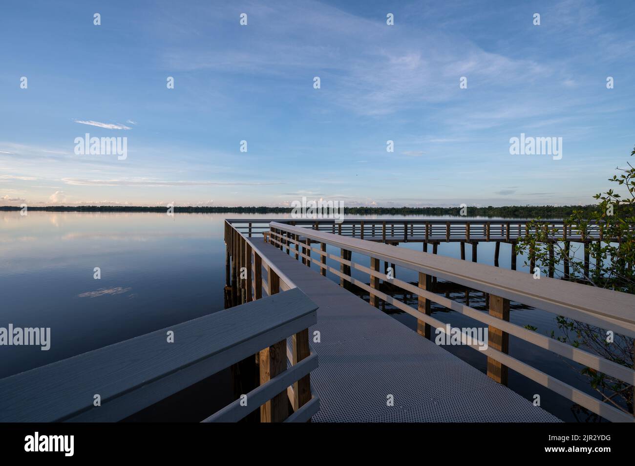 Sunrise cloudscape over West Lake boardwalk in Everglades National Park ...