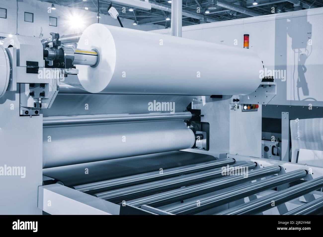 The operation of automatic plastic packaging production machine. roller ...