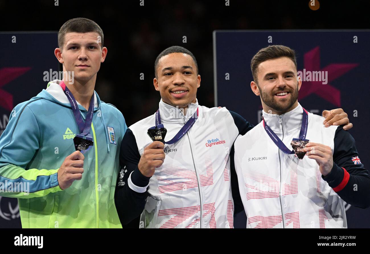 Great Britain's Joe Fraser (centre) celebrates with his gold medal ...