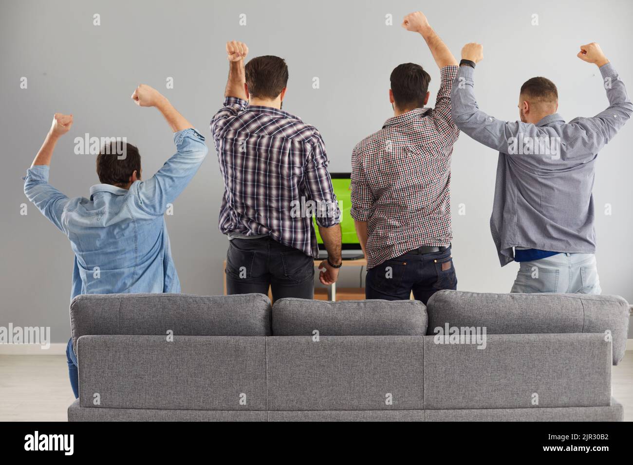 Group tv fans behind hi-res stock photography and images - Alamy
