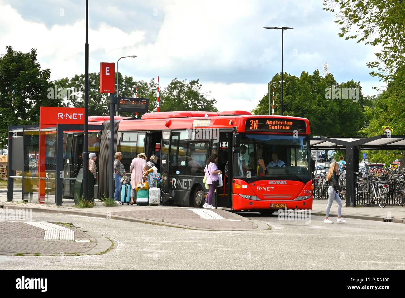Edam, Netherlands - August 2022: People getting on a bus to Amsterdam ...