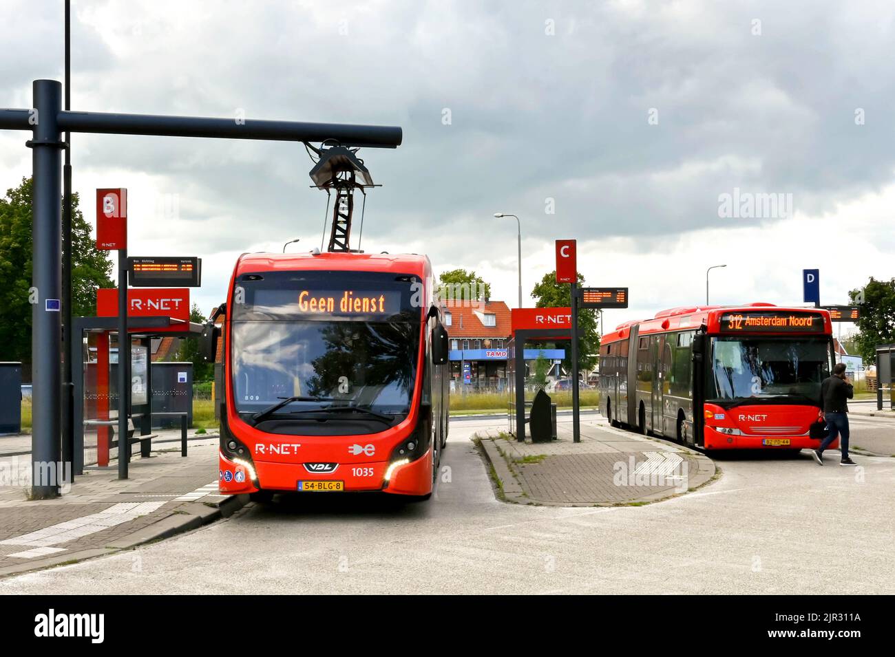 Edam, Netherlands - August 2022: Electric bus at the town's bus station ...