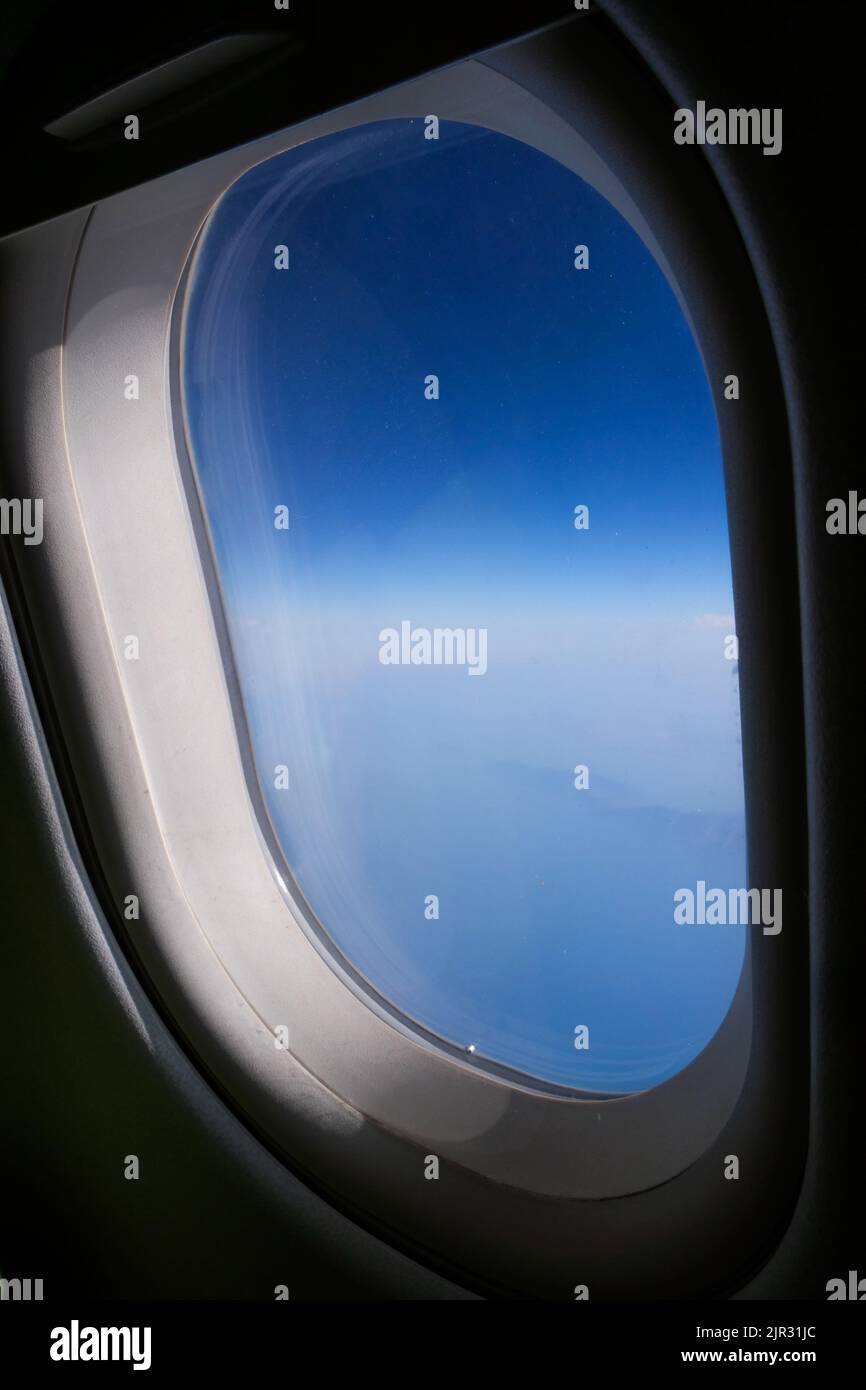 Plane's window, Flying by plane from Greece to France Stock Photo - Alamy