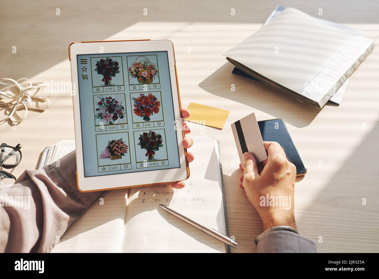 Man hands making online payment with tablet for shoping Stock Photo - Alamy