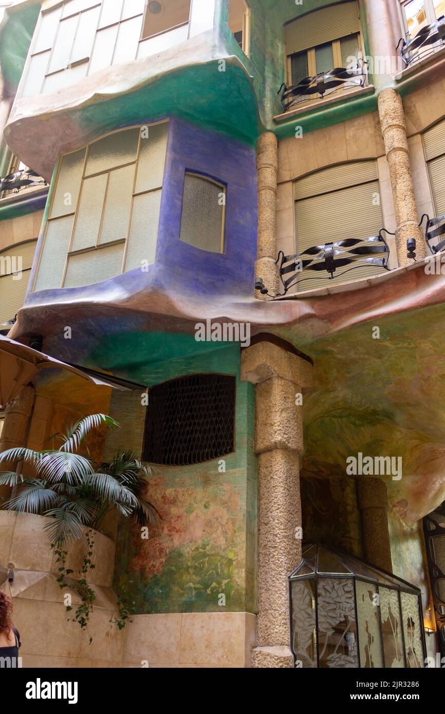 A vertical shot of the windows of the inner garden of Casa Mila ...