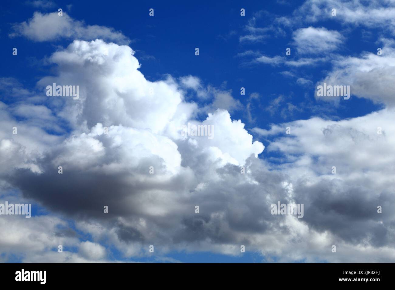 White cumulus clouds, grey clouds, blue sky, dramatic, turbulent sky ...