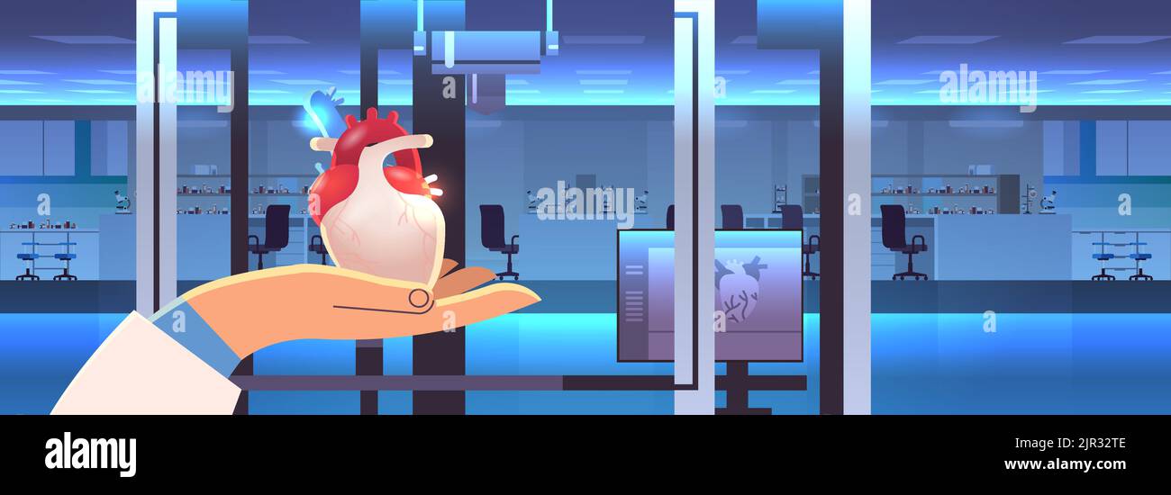 researcher hand holding heart model printed on 3d bio printer medical ...