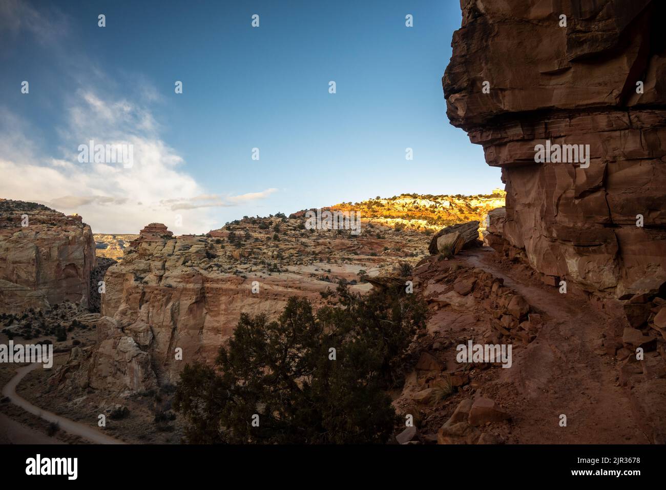 Trail Winds Around Red Rock Cliff in Capitol Reef toward Cassidy Arch ...