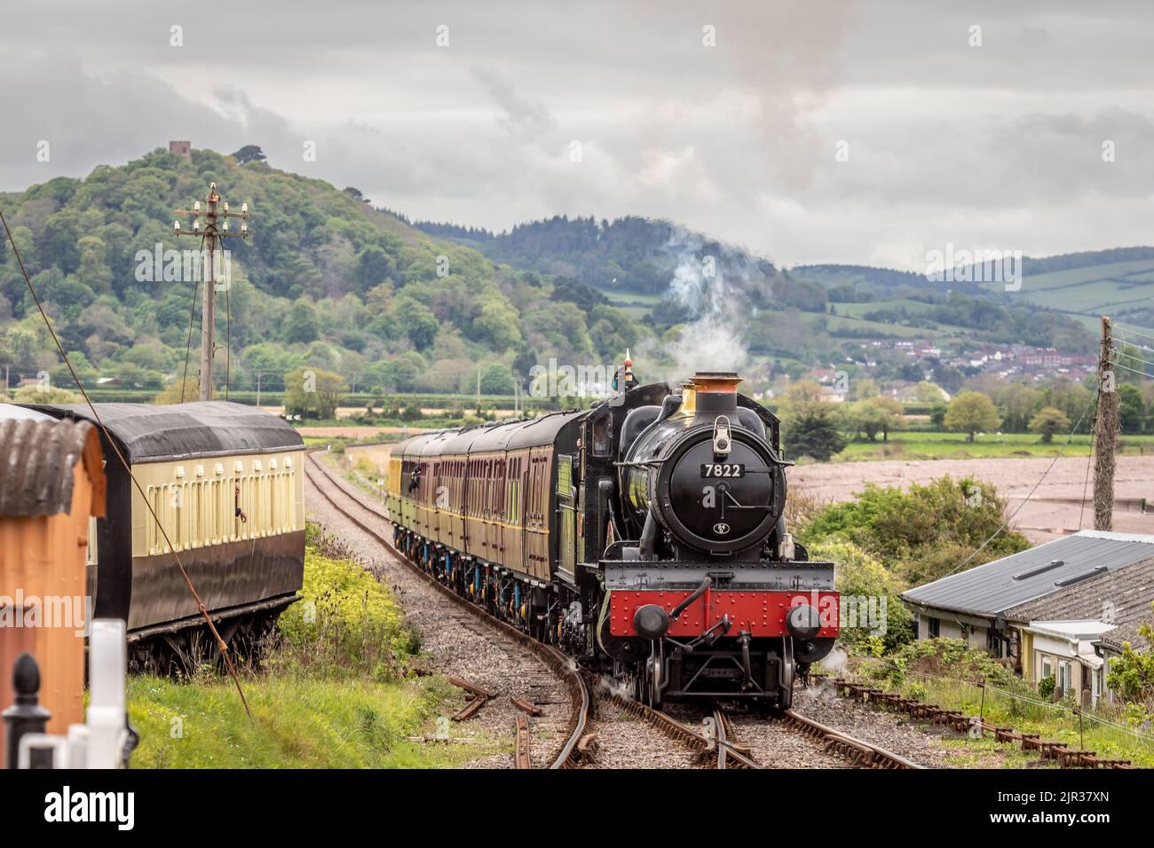 BR 'Manor' 4-6-0 No. 7822 'Foxcote Manor'approaches Blue Anchor station ...