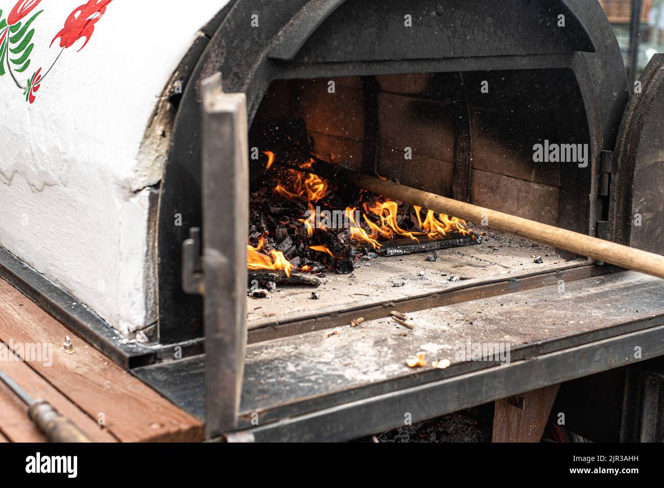 burning coals in the oven before baking pizza Stock Photo - Alamy