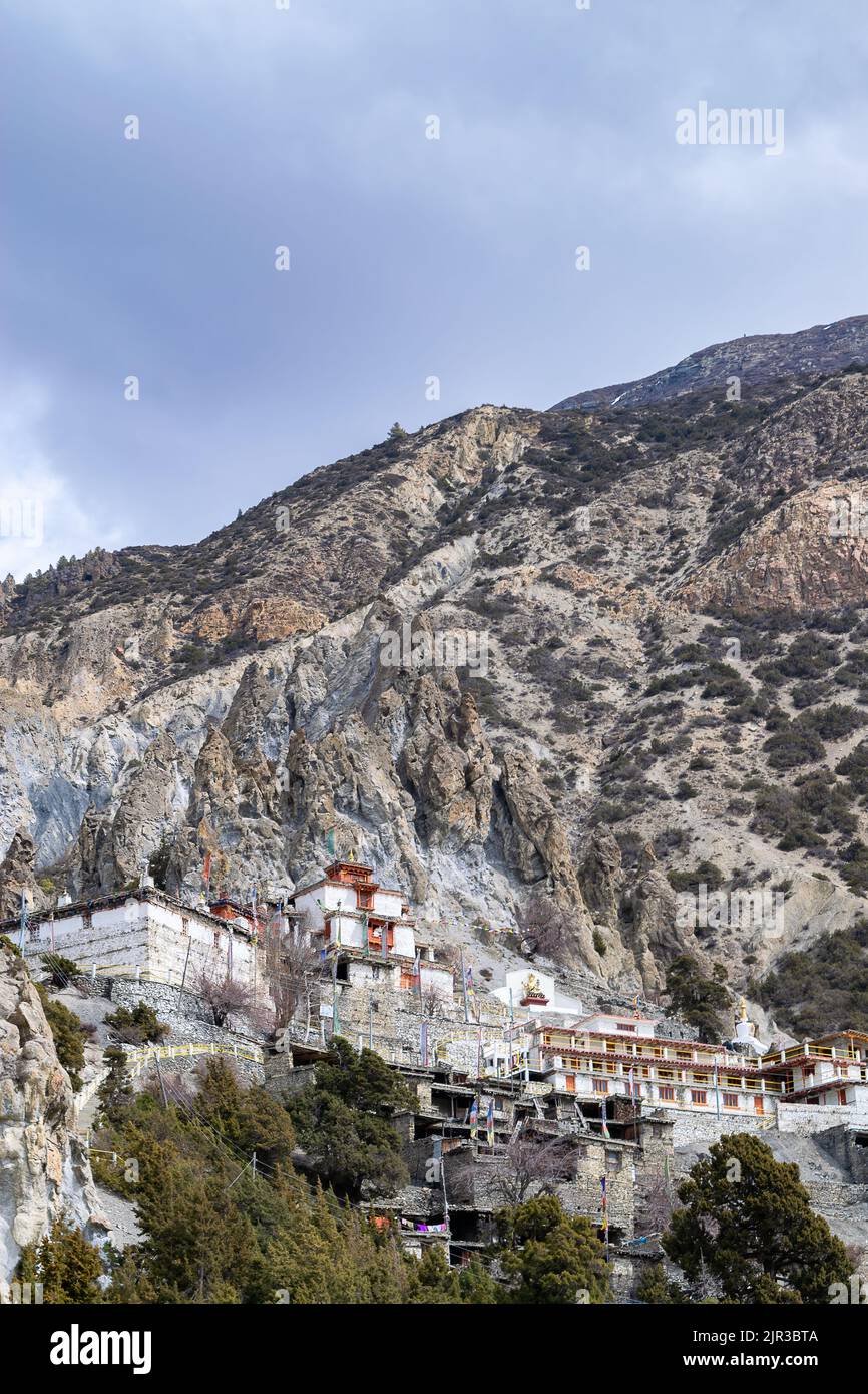 A vertical shot of Bhakra Buddhist Monastery on high Annapurna circuit ...