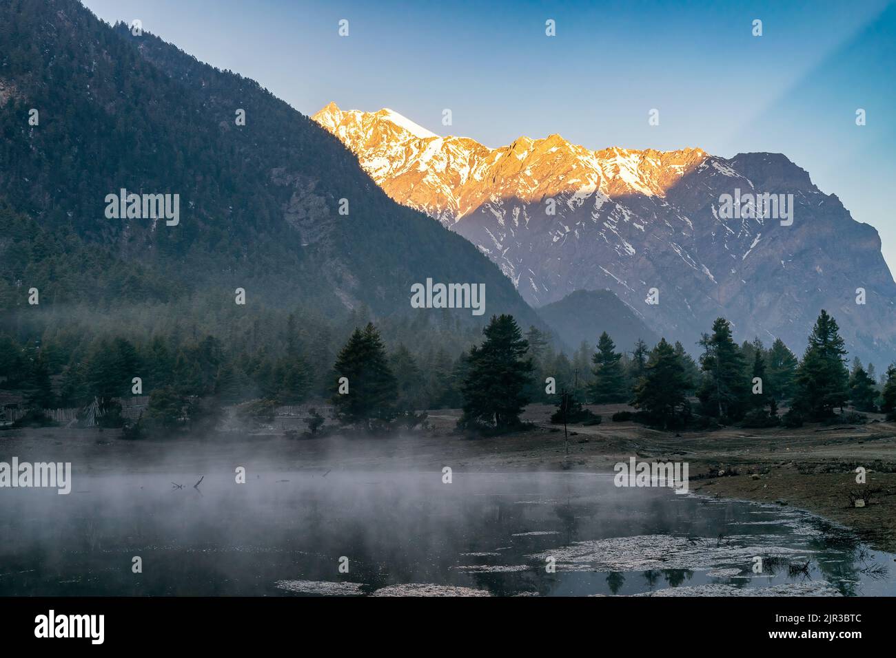The sunrise over Dhikur Pokhari village, Kaski District, Annapurna ...