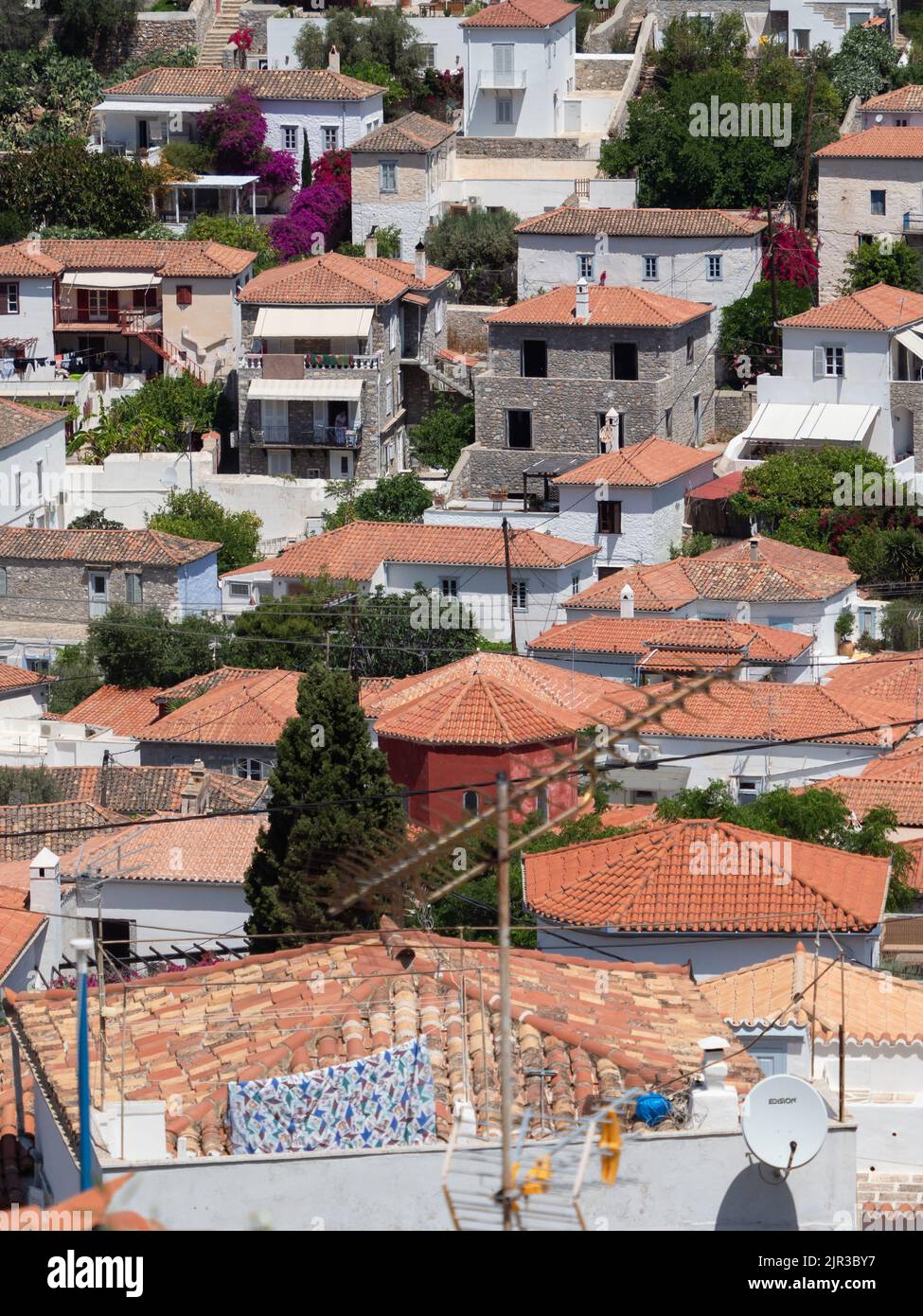Greek island terracotta rooftop view white villas and pink ...