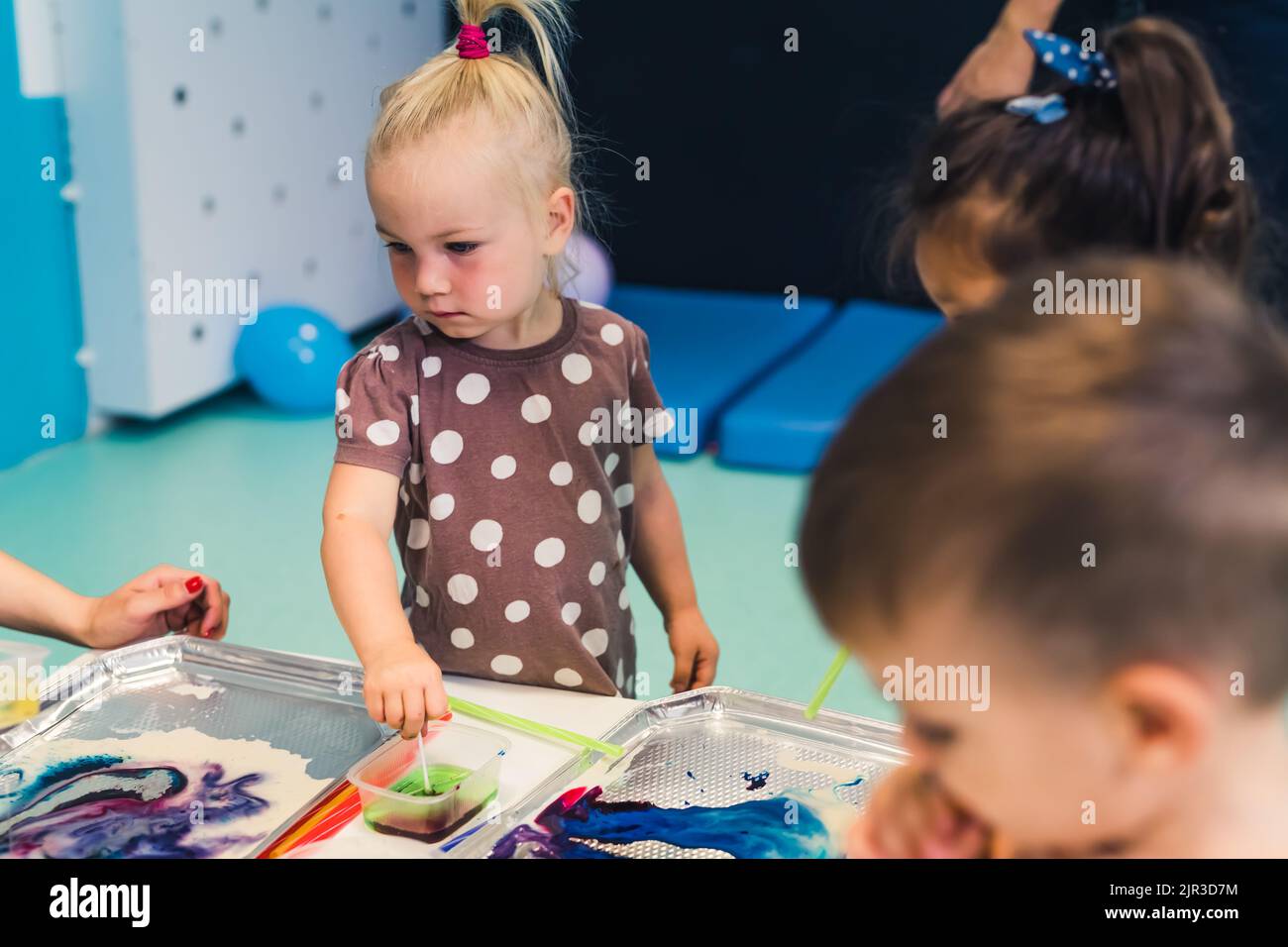 Happy children drawing with brush hi-res stock photography and images ...