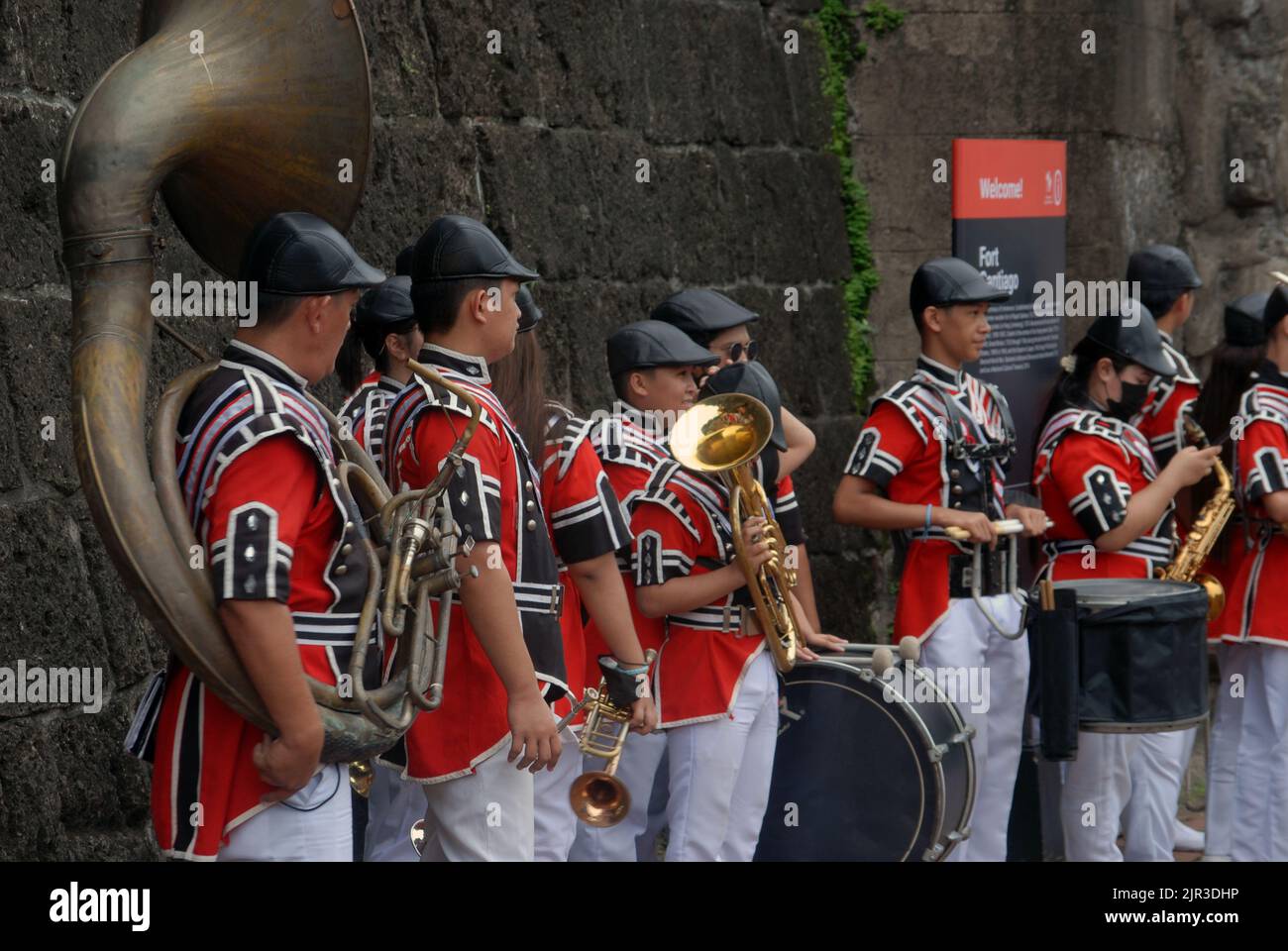 Band waiting to play as part of religious procession, Fort Santiago ...