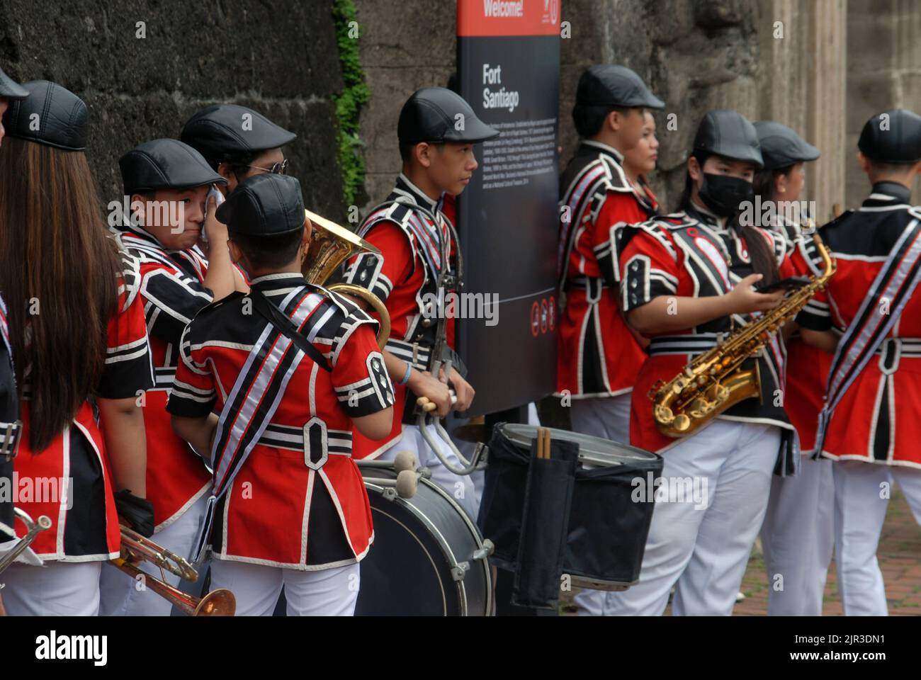 Band waiting to play as part of religious procession, Fort Santiago ...