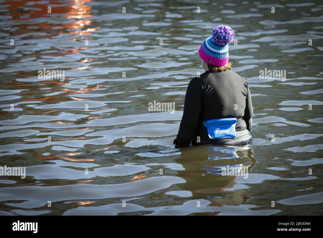An open water swimmer takes to the lake at the National Exhibition ...