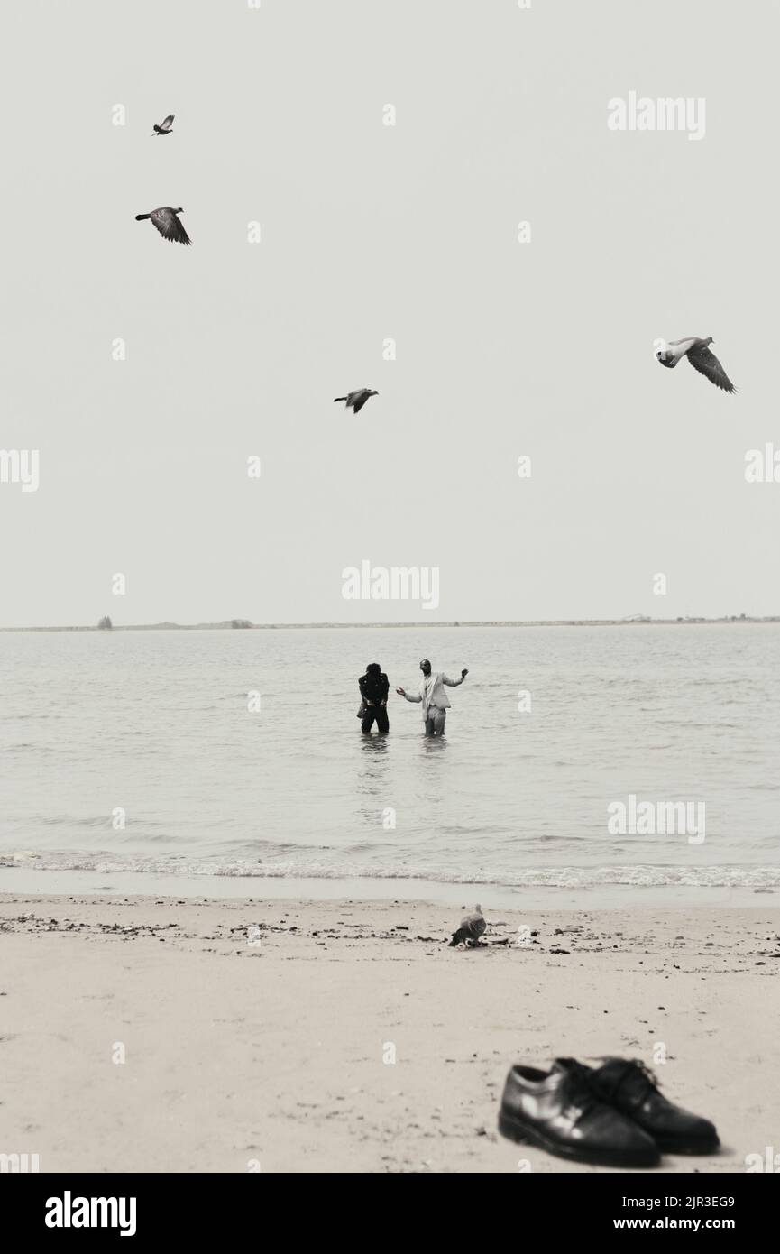 Praying in water hi-res stock photography and images - Alamy