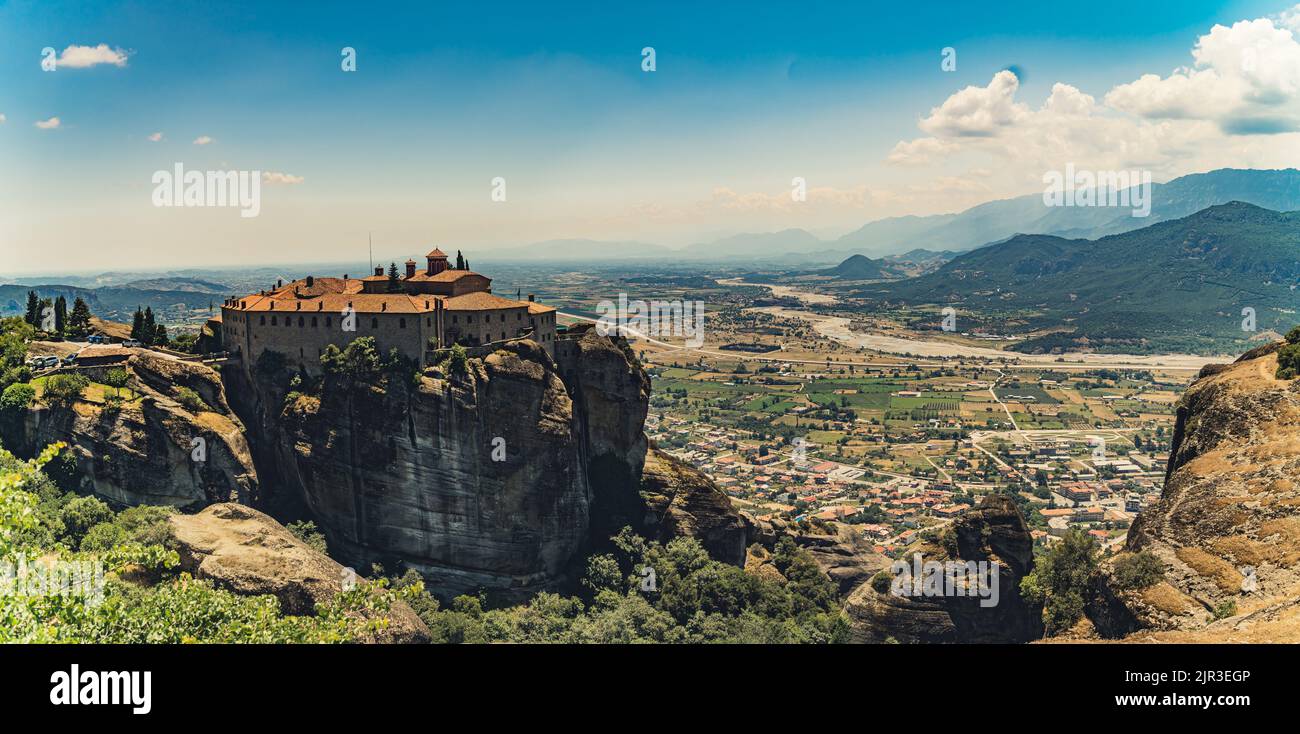 Wide panoramic drone view of one of many Meteora Monasteries placed on ...