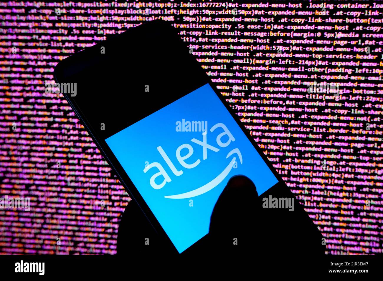 In this photo illustration an Alexa logo seen displayed on an android ...