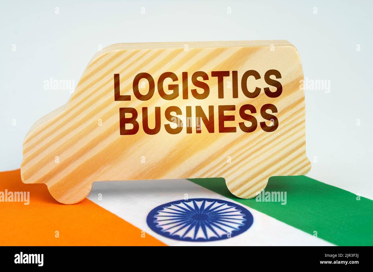 The concept of cargo transportation and logistics. On the flag of India ...