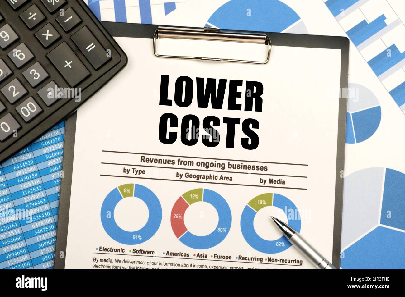 Business concept. Against the background of charts and graphs, there ...