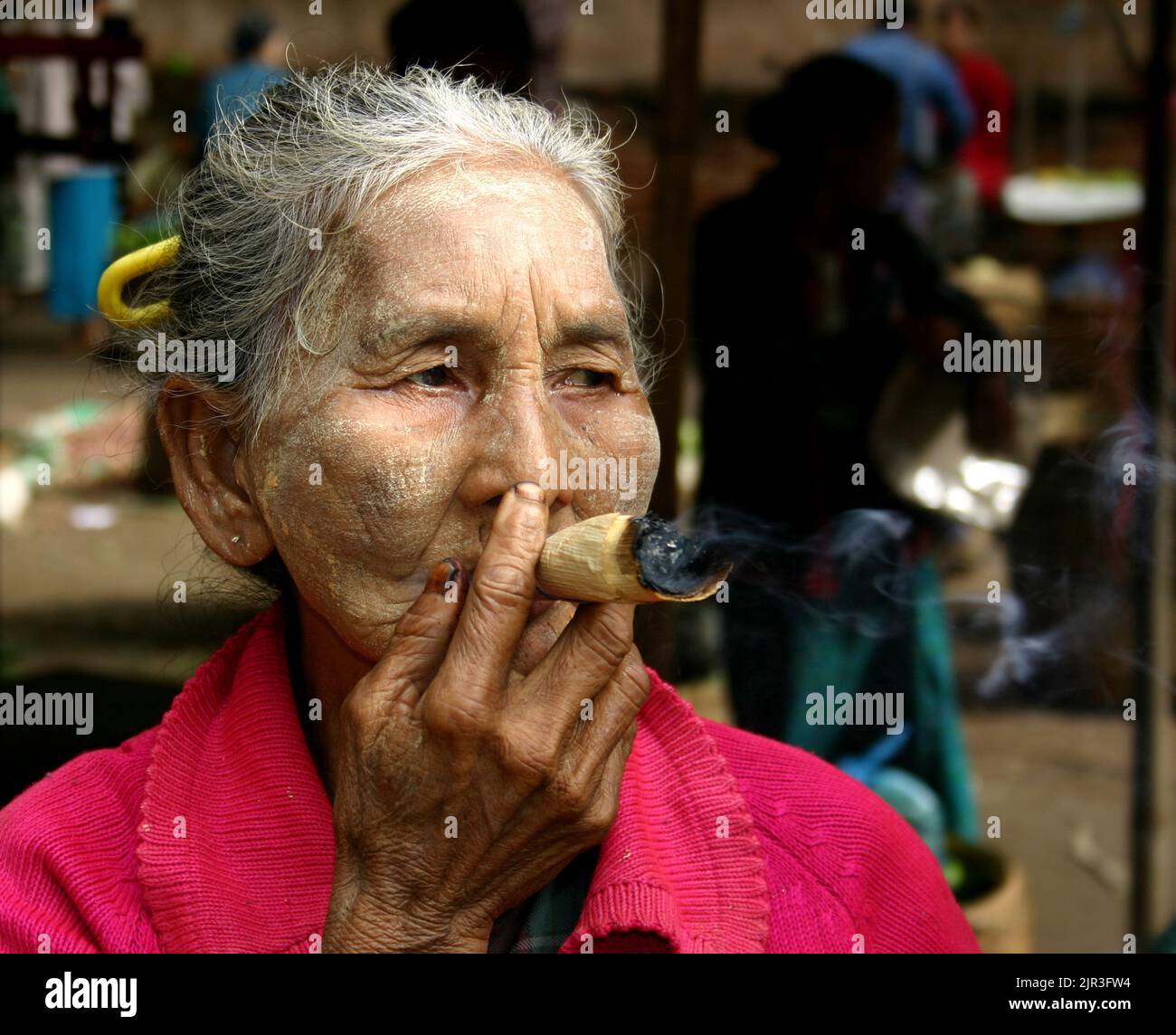 Mature woman smoking cigarette hi-res stock photography and images - Alamy