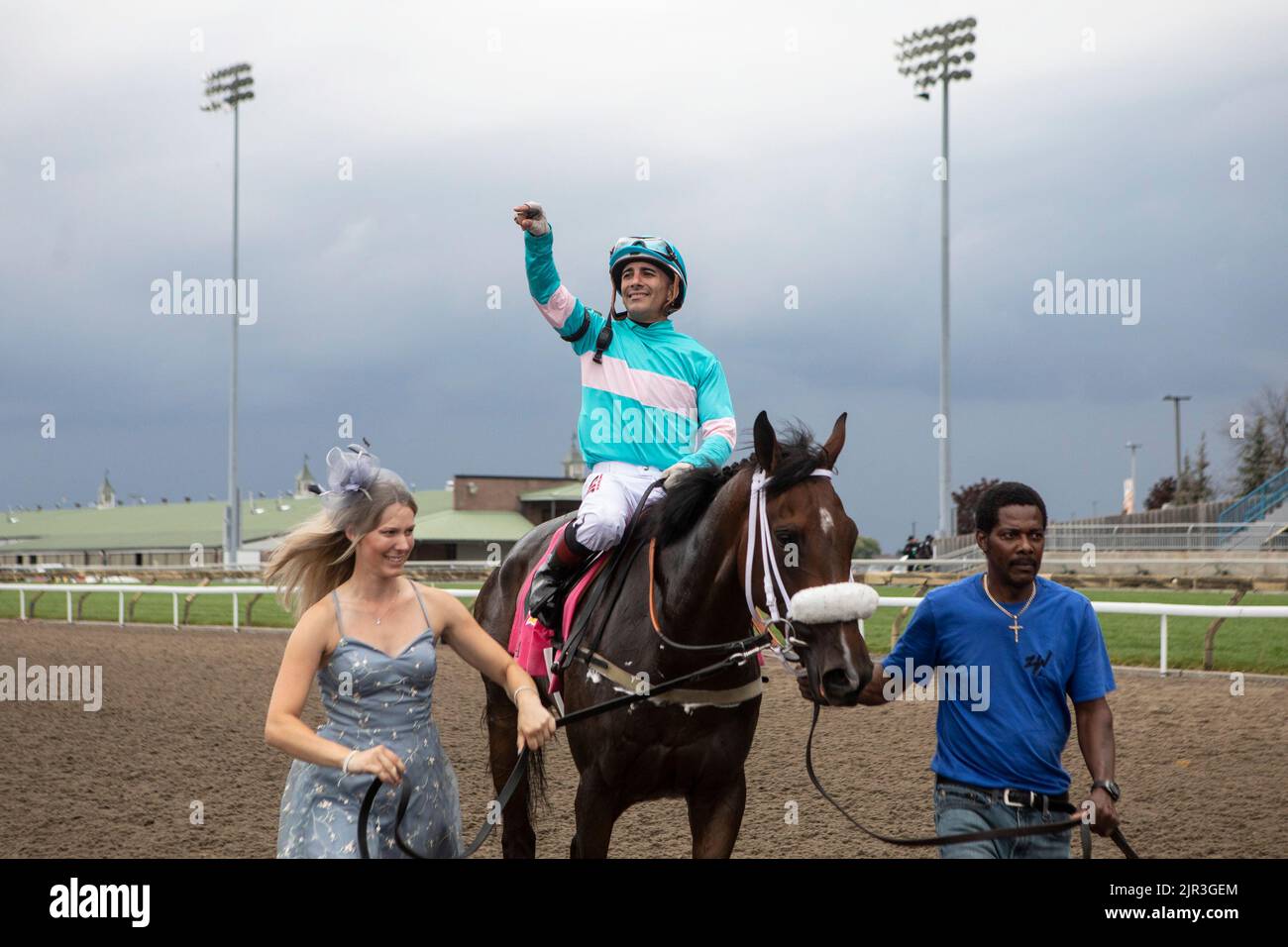 Jockey Rafael Hernandez celebrates as he is led to the winners circle ...