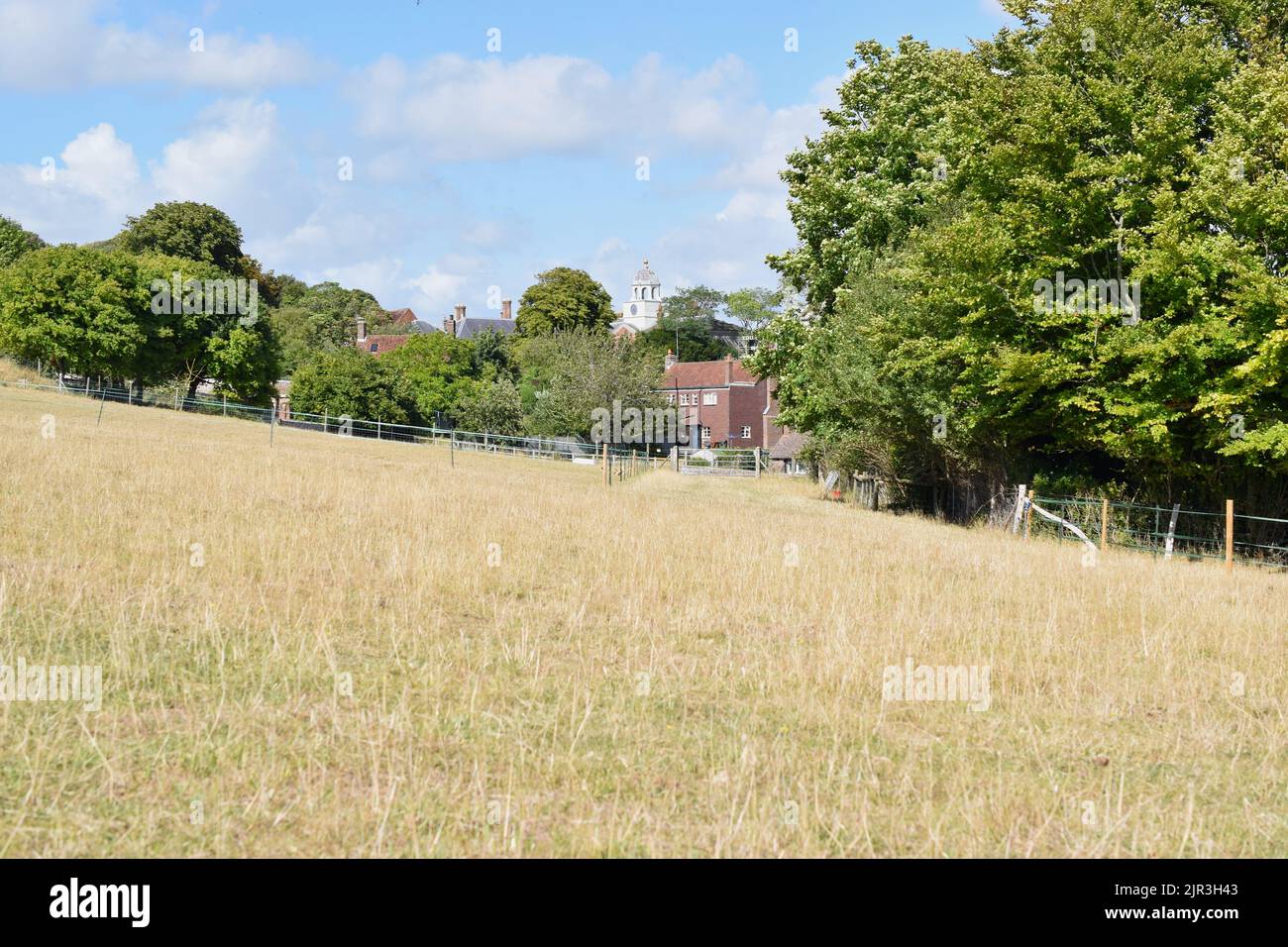 Very dry fields during drought 2022 in English village Glynde on a nice ...